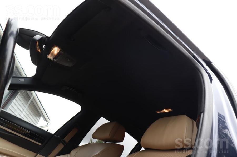 Blue BMW 740 2012 in Valmiera, with an engine capacity of 3.00 L and mileage of 293 thousand km for 9990 €, photo 28 on AUTOMOTO.COM.LV