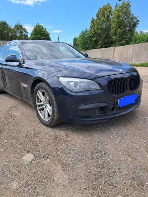 Blue BMW 740 2012 in Vilnius, with an engine capacity of 2.99 L and mileage of 206 thousand km for 7000 €, photo  on AUTOMOTO.COM.LV