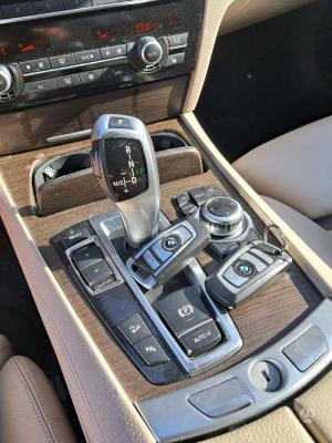 Blue BMW 740 2012 in Vilnius, with an engine capacity of 2.99 L and mileage of 206 thousand km for 7000 €, photo 12 on AUTOMOTO.COM.LV