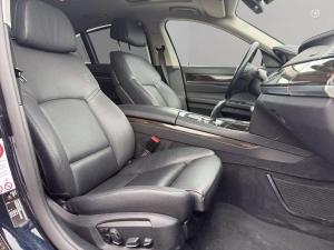 Blue BMW 740 2014 in Kaunas, with an engine capacity of 3.00 L and mileage of 254 thousand km for 13999 €, photo 9 on AUTOMOTO.COM.LV