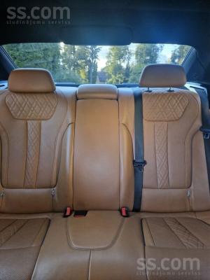 Blue BMW 740 2016 in Jelgava, with an engine capacity of 3.00 L and mileage of 260 thousand km for 28800 €, photo 7 on AUTOMOTO.COM.LV