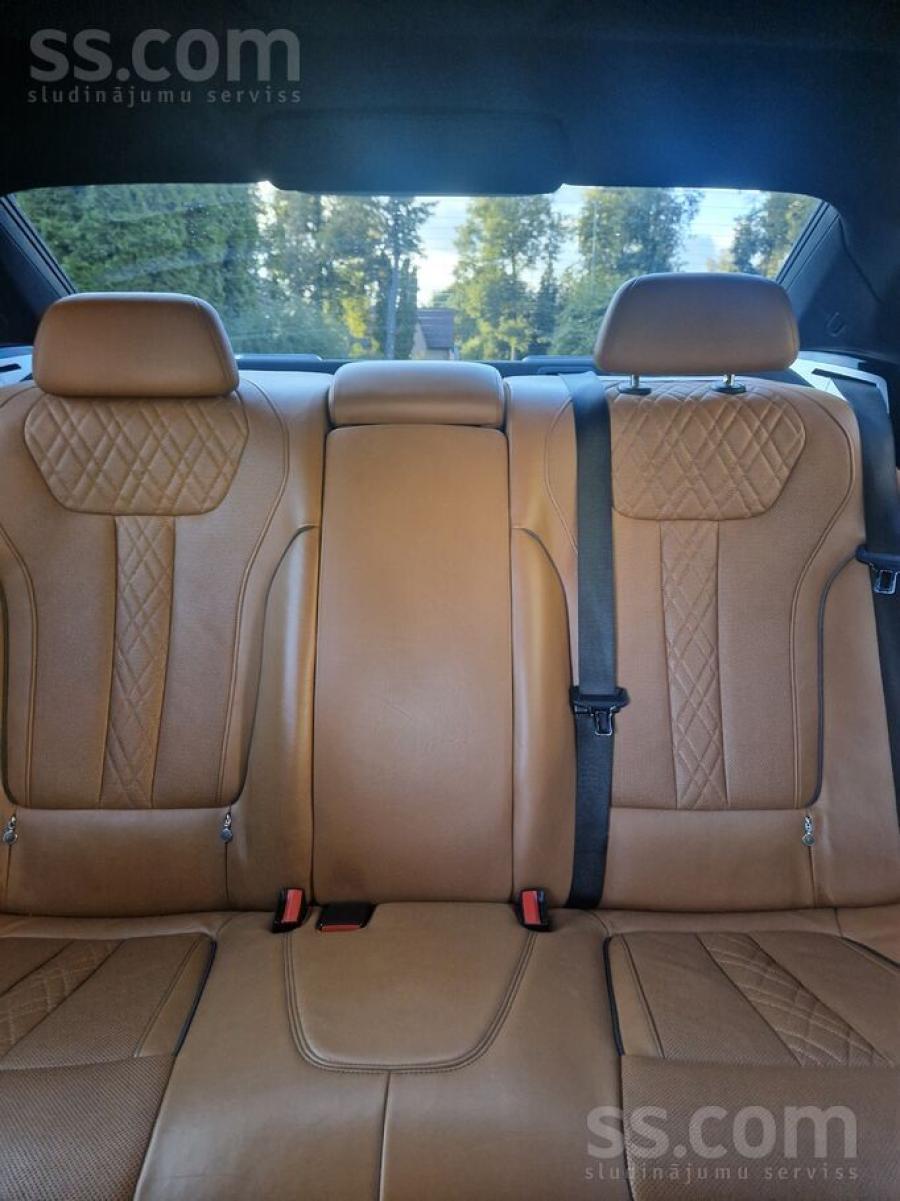Blue BMW 740 2016 in Jelgava, with an engine capacity of 3.00 L and mileage of 260 thousand km for 28800 €, photo 7 on AUTOMOTO.COM.LV
