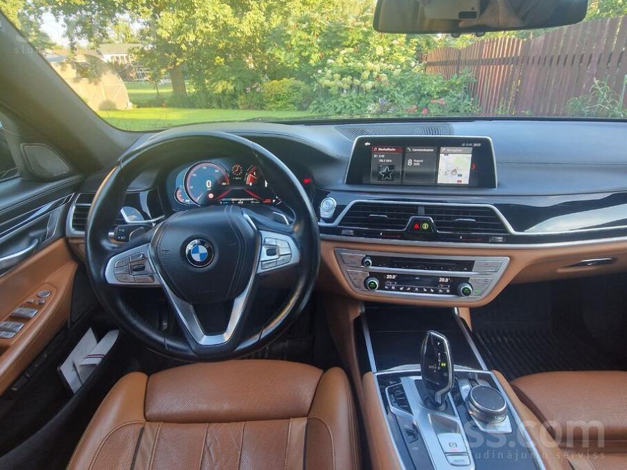 Blue BMW 740 2016 in Jelgava, with an engine capacity of 3.00 L and mileage of 260 thousand km for 28800 €, photo 8 on AUTOMOTO.COM.LV