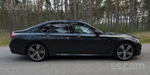 Blue BMW 740 2018 in Riga, with an engine capacity of 3.00 L and mileage of 208 thousand km for 30000 €, photo 4 on AUTOMOTO.COM.LV