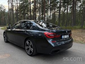Blue BMW 740 2018 in Riga, with an engine capacity of 3.00 L and mileage of 208 thousand km for 30000 €, photo 7 on AUTOMOTO.COM.LV
