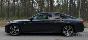 Blue BMW 740 2018 in Riga, with an engine capacity of 3.00 L and mileage of 208 thousand km for 30000 €, photo 8 on AUTOMOTO.COM.LV