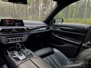 Blue BMW 740 2018 in Riga, with an engine capacity of 3.00 L and mileage of 208 thousand km for 30000 €, photo 12 on AUTOMOTO.COM.LV