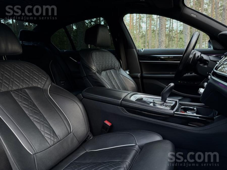 Blue BMW 740 2018 in Riga, with an engine capacity of 3.00 L and mileage of 208 thousand km for 30000 €, photo 13 on AUTOMOTO.COM.LV