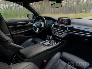 Blue BMW 740 2018 in Riga, with an engine capacity of 3.00 L and mileage of 208 thousand km for 30000 €, photo 14 on AUTOMOTO.COM.LV
