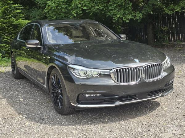 Brown BMW 740 2016 in Vilnius, with an engine capacity of 3.00 L and mileage of 128 thousand km for 19900 €, photo 4 on AUTOMOTO.COM.LV