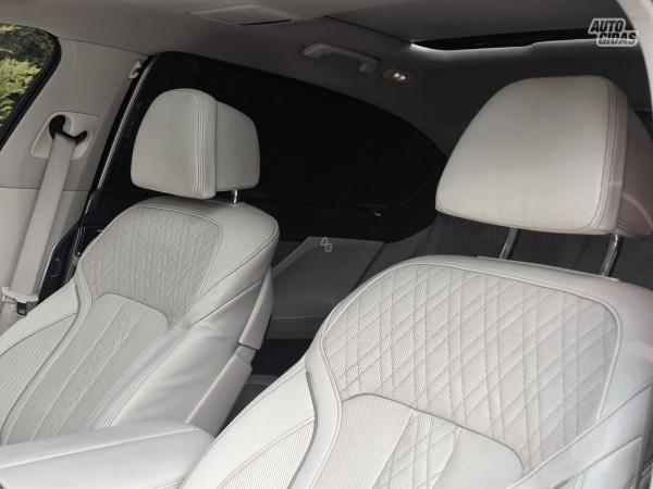 Brown BMW 740 2016 in Vilnius, with an engine capacity of 3.00 L and mileage of 128 thousand km for 19900 €, photo 6 on AUTOMOTO.COM.LV