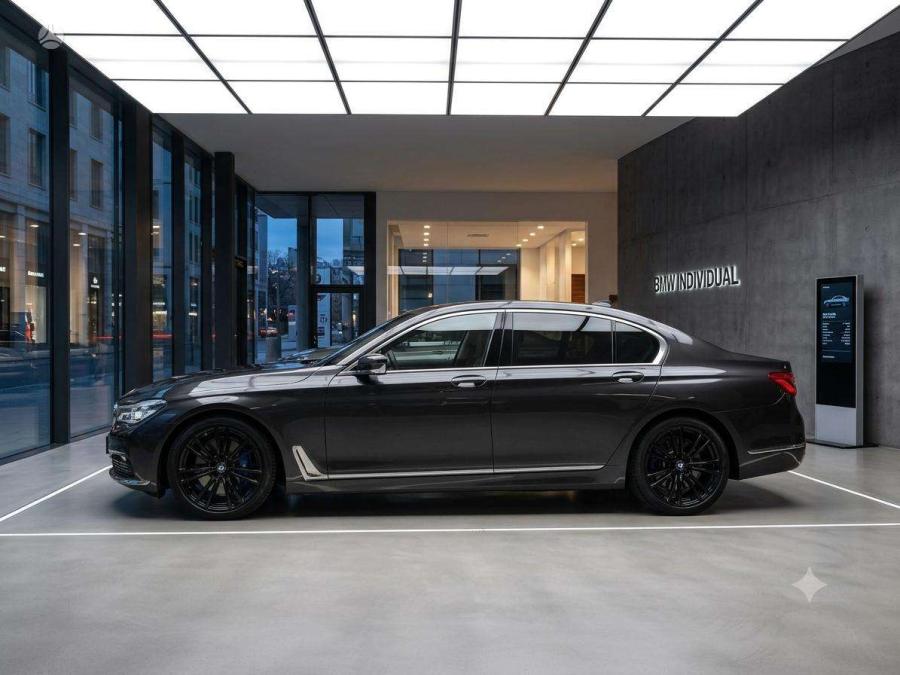 Brown BMW 740 2016 in Vilnius, with an engine capacity of 3.00 L and mileage of 128 thousand km for 19900 €, photo 1 on AUTOMOTO.COM.LV