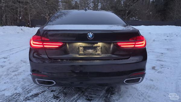 Brown BMW 740 2017 in Vilnius, with an engine capacity of 3.00 L and mileage of 128 thousand km for 22000 €, photo 2 on AUTOMOTO.COM.LV