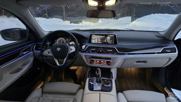 Brown BMW 740 2017 in Vilnius, with an engine capacity of 3.00 L and mileage of 128 thousand km for 22000 €, photo 8 on AUTOMOTO.COM.LV