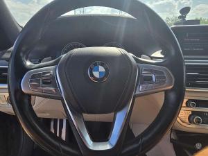 Grey BMW 740 2017 in Kaunas, with an engine capacity of 2.99 L and mileage of 300 thousand km for 25999 €, photo 6 on AUTOMOTO.COM.LV