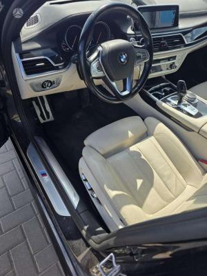 Grey BMW 740 2017 in Kaunas, with an engine capacity of 2.99 L and mileage of 300 thousand km for 25999 €, photo 8 on AUTOMOTO.COM.LV