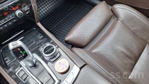Grey BMW 740 2009 in Riga, with an engine capacity of 3.00 L and mileage of 277 thousand km for 12500 €, photo 22 on AUTOMOTO.COM.LV