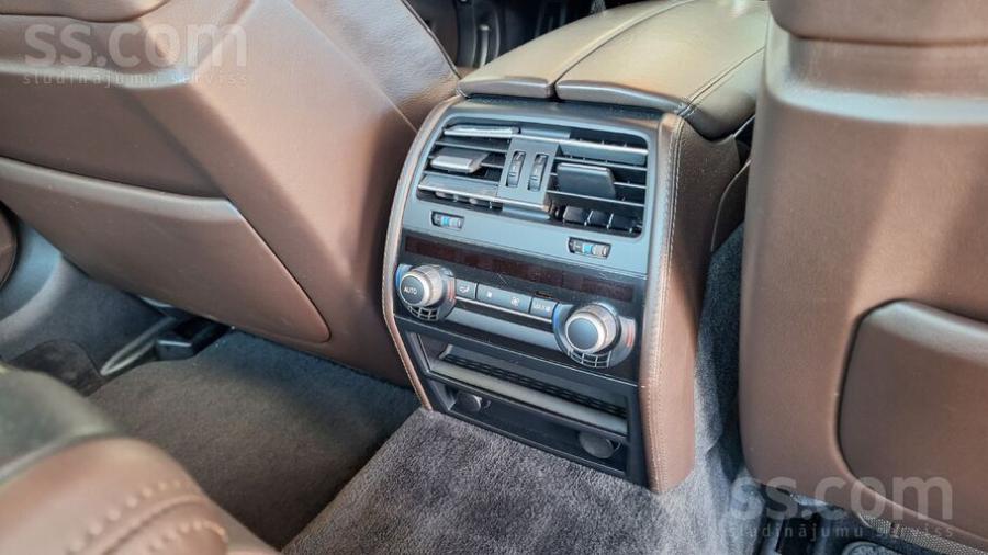 Grey BMW 740 2009 in Riga, with an engine capacity of 3.00 L and mileage of 277 thousand km for 12500 €, photo 24 on AUTOMOTO.COM.LV