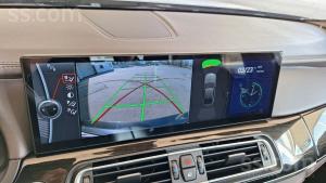Grey BMW 740 2009 in Riga, with an engine capacity of 3.00 L and mileage of 277 thousand km for 12500 €, photo 26 on AUTOMOTO.COM.LV
