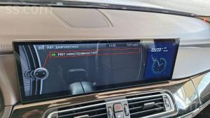 Grey BMW 740 2009 in Riga, with an engine capacity of 3.00 L and mileage of 277 thousand km for 12500 €, photo 28 on AUTOMOTO.COM.LV