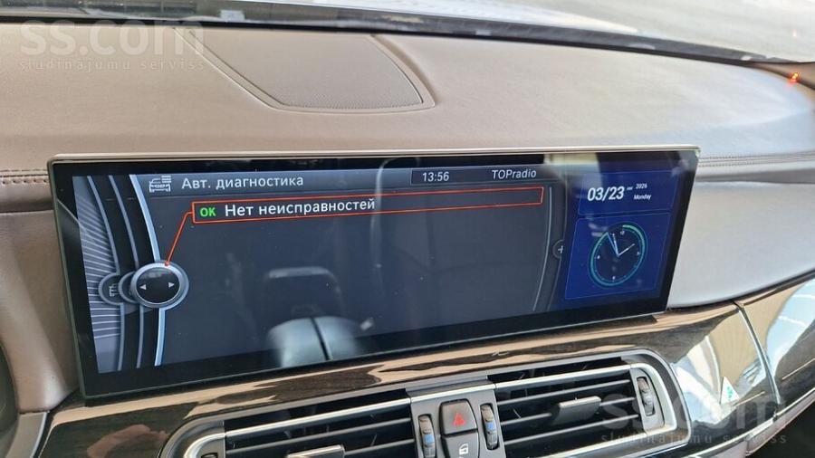 Grey BMW 740 2009 in Riga, with an engine capacity of 3.00 L and mileage of 277 thousand km for 12500 €, photo 28 on AUTOMOTO.COM.LV
