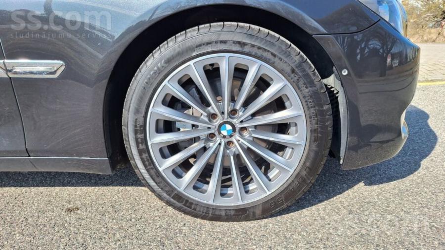 Grey BMW 740 2009 in Riga, with an engine capacity of 3.00 L and mileage of 277 thousand km for 12500 €, photo 33 on AUTOMOTO.COM.LV
