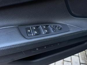 Grey BMW 740 2011 in Riga, with an engine capacity of 3.00 L and mileage of 284 thousand km for 9990 €, photo 13 on AUTOMOTO.COM.LV