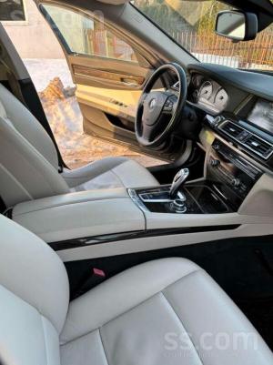 Grey BMW 740 2014 in Valmiera, with an engine capacity of 3.00 L and mileage of 196 thousand km for 19200 €, photo 6 on AUTOMOTO.COM.LV
