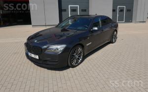 Grey BMW 740 2014 in Riga, with an engine capacity of 3.00 L and mileage of 349 thousand km for 14500 €, photo 4 on AUTOMOTO.COM.LV