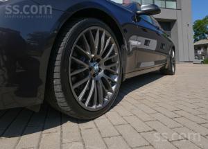 Grey BMW 740 2014 in Riga, with an engine capacity of 3.00 L and mileage of 349 thousand km for 14500 €, photo 15 on AUTOMOTO.COM.LV
