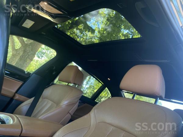 Grey BMW 740 2015 in Riga, with an engine capacity of 3.00 L and mileage of 238 thousand km for 23000 €, photo 9 on AUTOMOTO.COM.LV