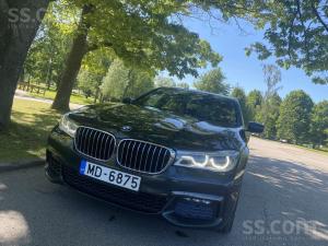 Pelēks BMW 740 2015 Rīga, ar dzinēja tilpumu 3.00 L un nobraukumu 238 tūkst. km par 19500 €, foto  vietnē AUTOMOTO.COM.LV