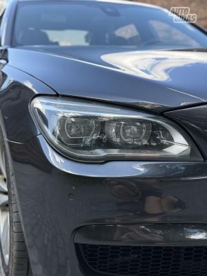 Grey BMW 740 2015 in Vilnius, with an engine capacity of 3.00 L and mileage of 210 thousand km for 14999 €, photo 15 on AUTOMOTO.COM.LV