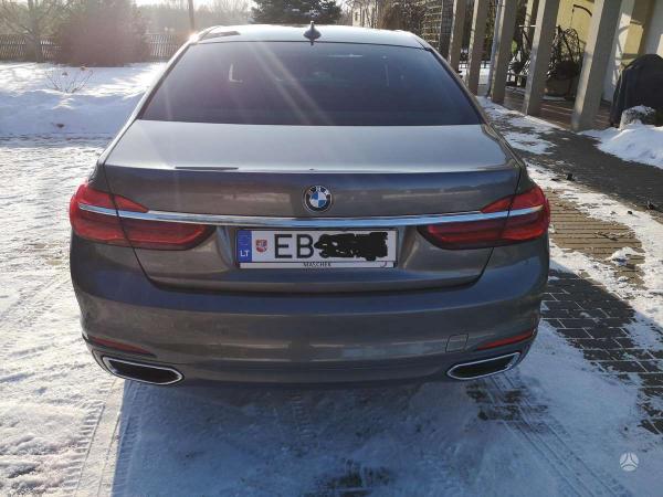 Grey BMW 740 2016 in Siauliai, with an engine capacity of 2.00 L and mileage of 212 thousand km for 21900 €, photo 4 on AUTOMOTO.COM.LV