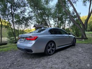 Grey BMW 740 2017 in Klaipeda, with an engine capacity of 2.99 L and mileage of 198 thousand km for 26500 €, photo 9 on AUTOMOTO.COM.LV