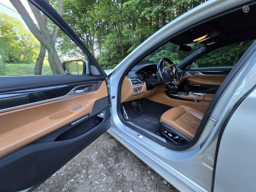 Grey BMW 740 2017 in Klaipeda, with an engine capacity of 2.99 L and mileage of 198 thousand km for 26500 €, photo 12 on AUTOMOTO.COM.LV