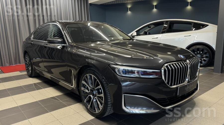 Grey BMW 740 2021 in Riga, with an engine capacity of 3.00 L and mileage of 121 thousand km for 41990 €, photo 4 on AUTOMOTO.COM.LV