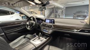 Grey BMW 740 2021 in Riga, with an engine capacity of 3.00 L and mileage of 121 thousand km for 41990 €, photo 15 on AUTOMOTO.COM.LV