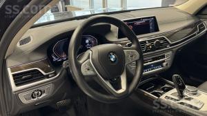 Grey BMW 740 2021 in Riga, with an engine capacity of 3.00 L and mileage of 121 thousand km for 41990 €, photo 22 on AUTOMOTO.COM.LV