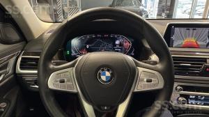 Grey BMW 740 2021 in Riga, with an engine capacity of 3.00 L and mileage of 121 thousand km for 41990 €, photo 29 on AUTOMOTO.COM.LV