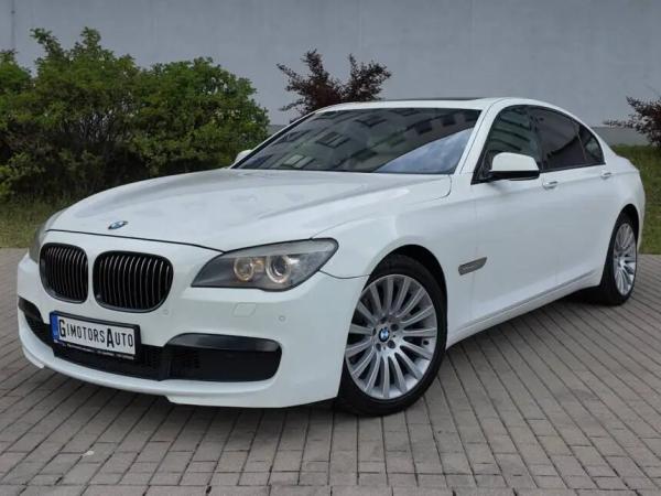 White BMW 740 2009 in Riga, with an engine capacity of 3.00 L and mileage of 388 thousand km for 8990 €, photo 1 on AUTOMOTO.COM.LV