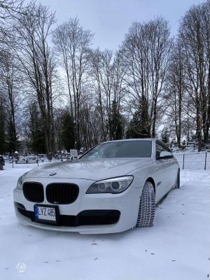 White BMW 740 2013 in Siauliai, with an engine capacity of 3.00 L and mileage of 184 thousand km for 12400 €, photo  on AUTOMOTO.COM.LV