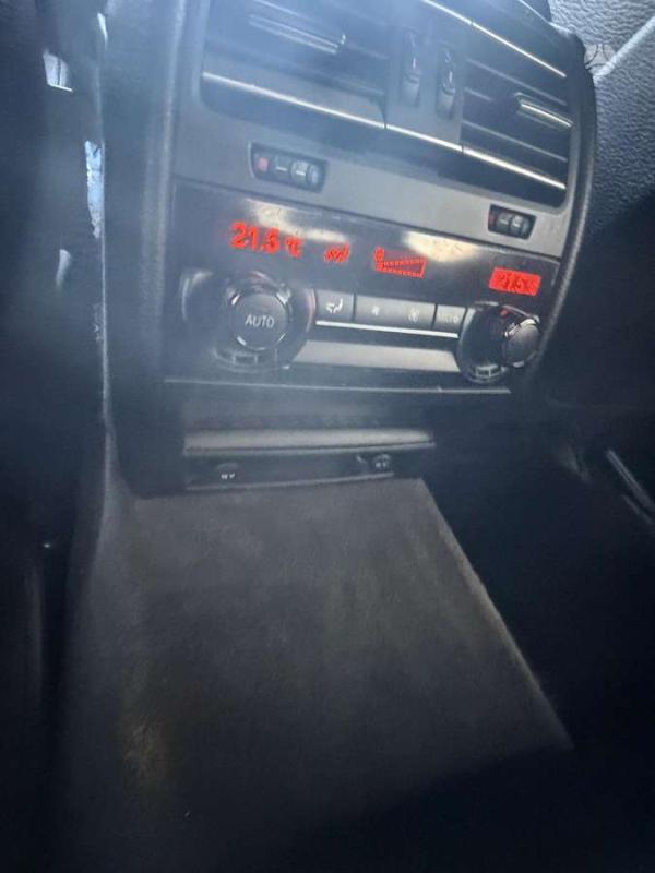 White BMW 740 2013 in Vilnius, with an engine capacity of 2.98 L and mileage of 196 thousand km for 11200 €, photo 10 on AUTOMOTO.COM.LV
