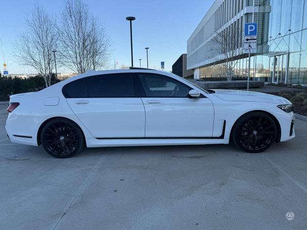 White BMW 740 2020 in Vilnius, with an engine capacity of 3.00 L and mileage of 96 thousand km for 40500 €, photo 5 on AUTOMOTO.COM.LV