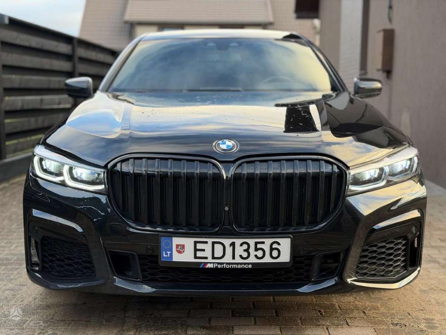 Black BMW 745 2019 in Taurage, with an engine capacity of 0.00 L and mileage of 106 thousand km for 35999 €, photo 2 on AUTOMOTO.COM.LV