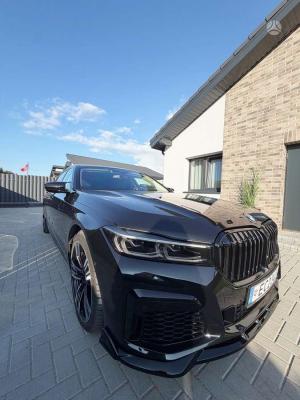 Black BMW 745 2020 in Klaipeda, with an engine capacity of 3.00 L and mileage of 93 thousand km for 42999 €, photo 4 on AUTOMOTO.COM.LV
