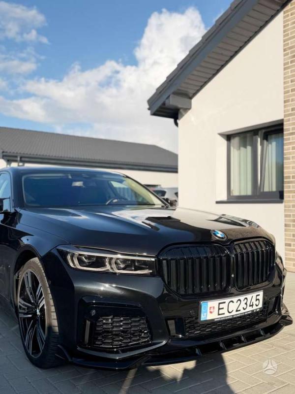 Black BMW 745 2020 in Klaipeda, with an engine capacity of 3.00 L and mileage of 93 thousand km for 42999 €, photo 7 on AUTOMOTO.COM.LV
