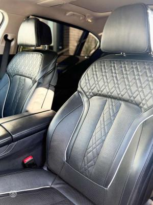 Black BMW 745 2020 in Klaipeda, with an engine capacity of 3.00 L and mileage of 93 thousand km for 42999 €, photo 10 on AUTOMOTO.COM.LV