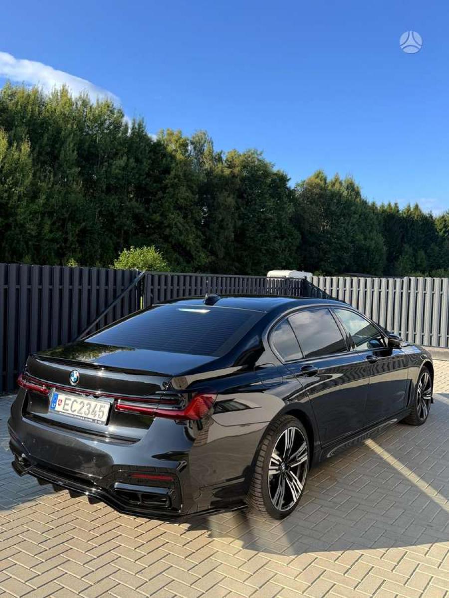 Black BMW 745 2020 in Klaipeda, with an engine capacity of 3.00 L and mileage of 93 thousand km for 42999 €, photo 12 on AUTOMOTO.COM.LV
