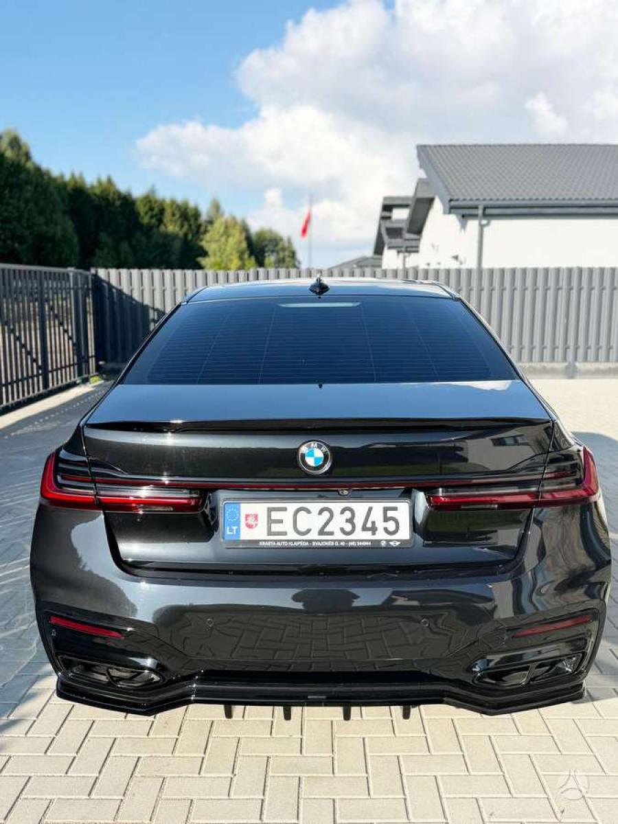 Black BMW 745 2020 in Klaipeda, with an engine capacity of 3.00 L and mileage of 93 thousand km for 42999 €, photo 14 on AUTOMOTO.COM.LV